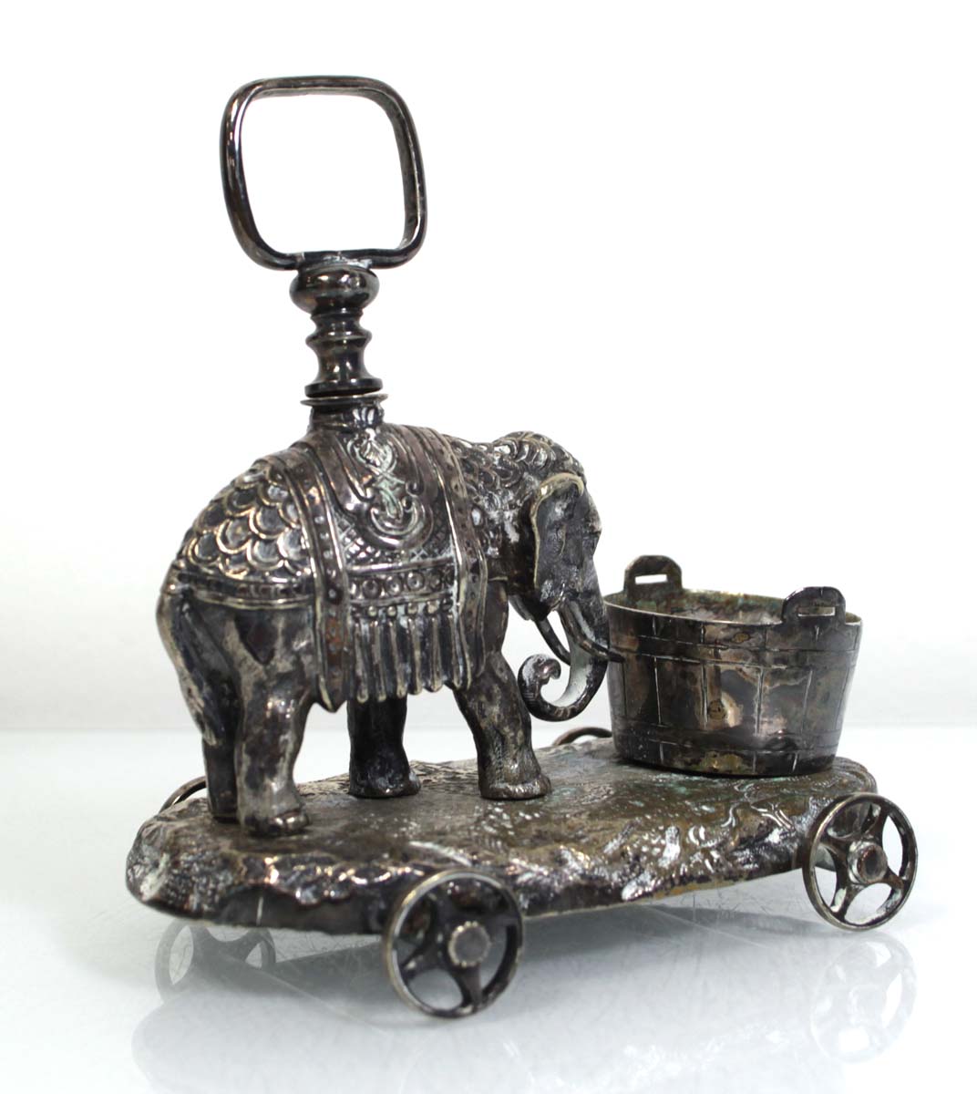 Lot 304 - A cast metal cruet stand modelled as an