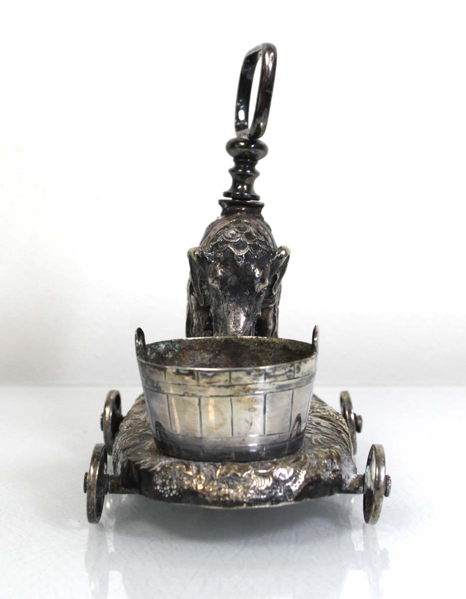 Lot 304 - A cast metal cruet stand modelled as an